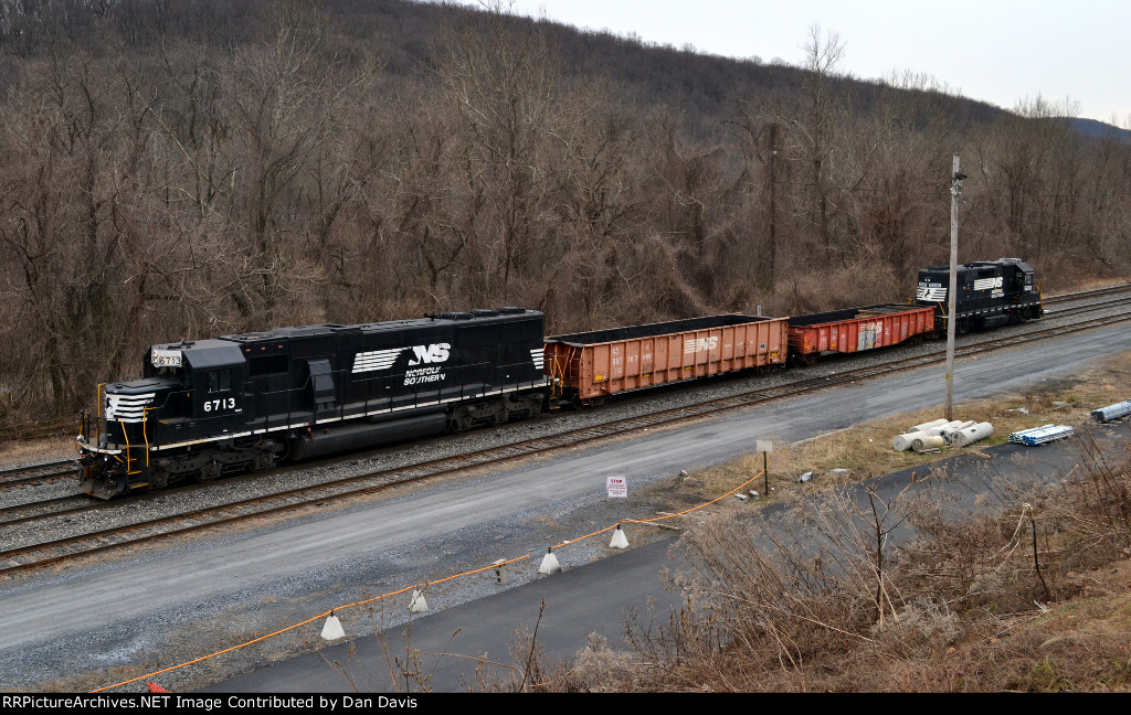 NS SD70 6713 bringing up the rear of 99W